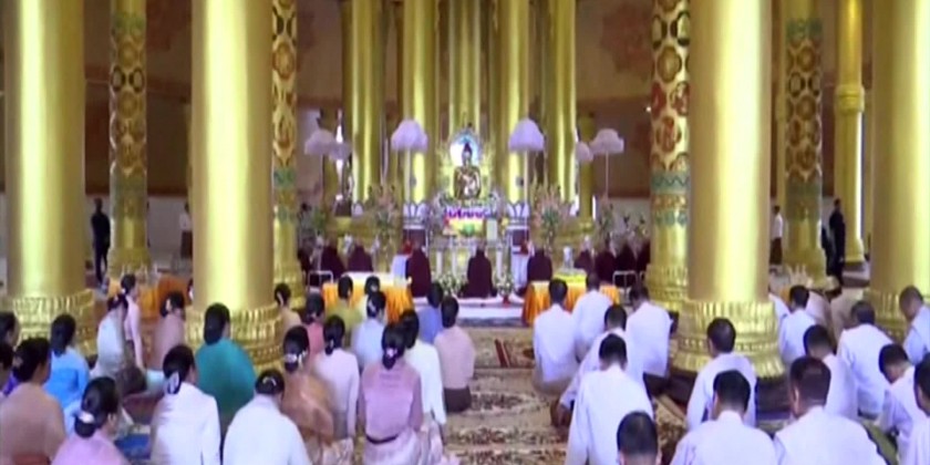Religious ceremony: Diamond orb and pennant-shaped vane hoisted ...