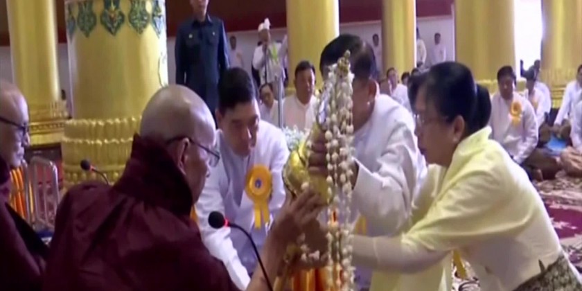 Religious ceremony: Diamond orb and pennant-shaped vane hoisted ...