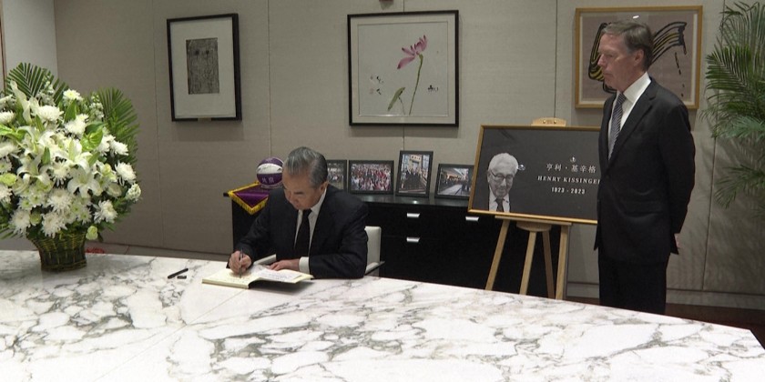 China's top diplomat signs for Kissinger at US embassy event | Myanmar ...