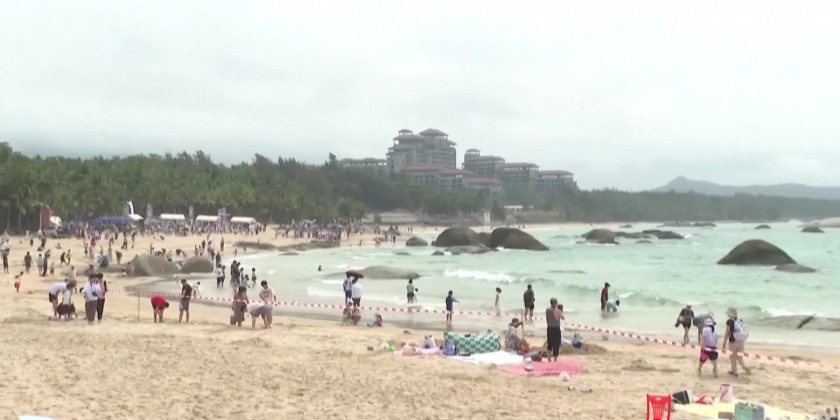 People gather at a beach to watch China's lunar probe launch | Myanmar ...