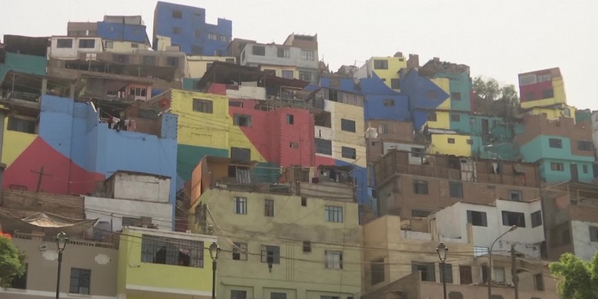 Final touches over colorful mural in Lima hillside | Myanmar ...